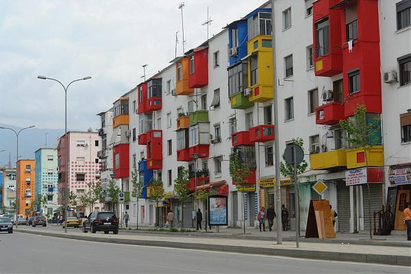 Old commie building painted with bright colors - Tirana